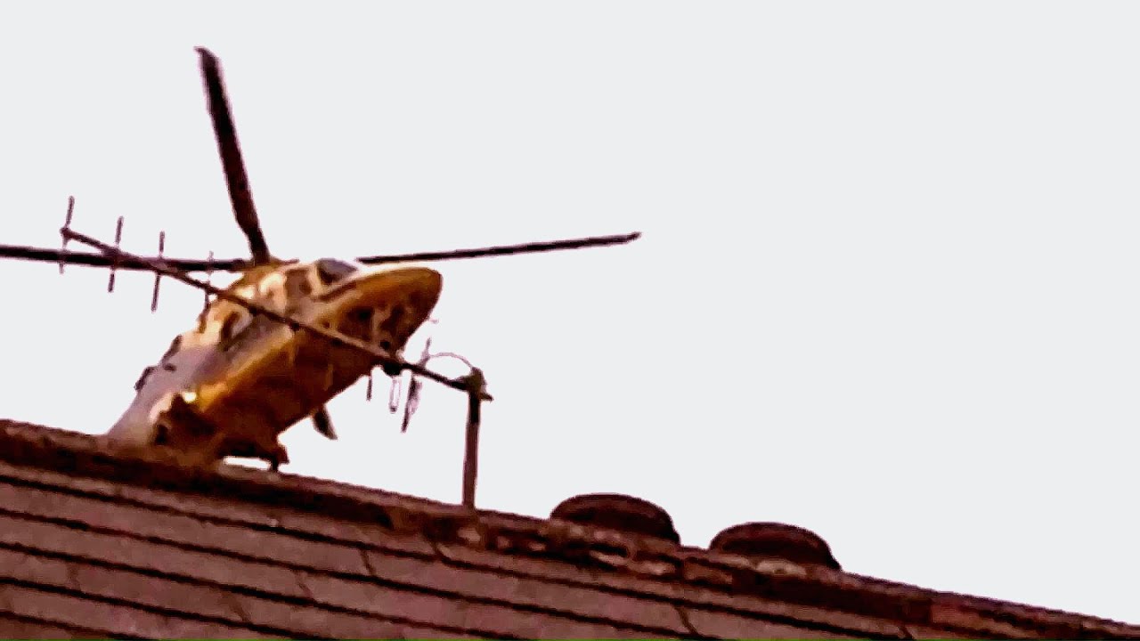 Chopper at the roof | Helicopter over Terrace | Chopper Hovering at ...