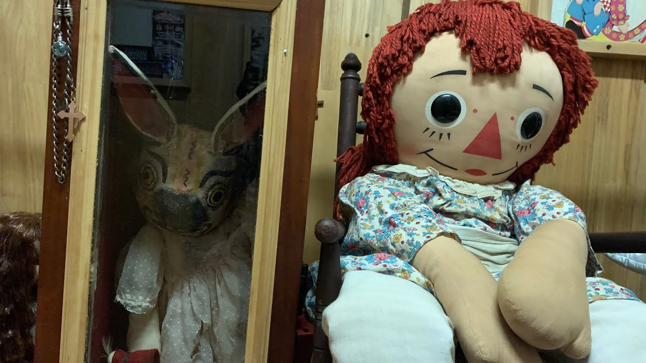 A devil doll and a haunted children's rocking chair from France. - YouTube