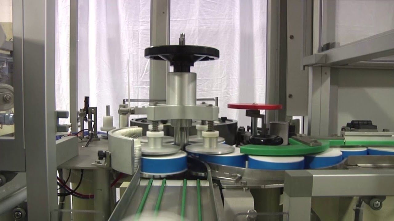 Buffer machine for cheese round boxes - YouTube