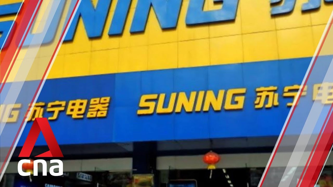 Chinese retail giant Suning buys Carrefour's China business - YouTube