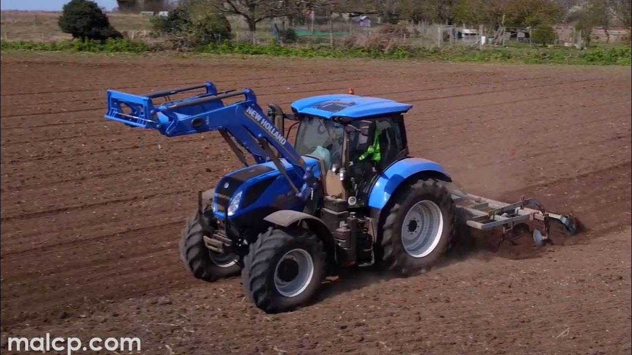 New Holland T7.210 with 770TL loader pulling a Lemken Terradisc ...