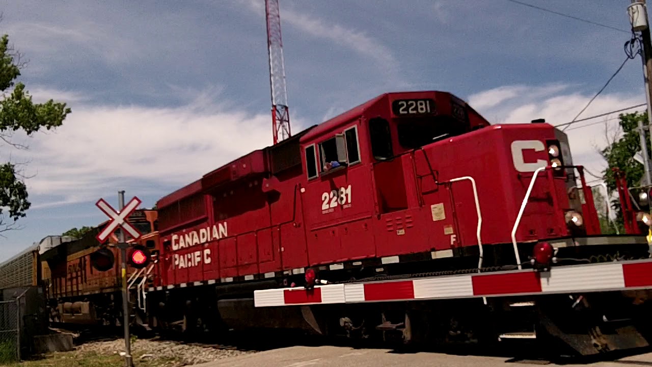 CP 244 w/ CP 2281 & BNSF 4212 hooked E.S. lead this short EB Autorack/Mixed freight train by ...