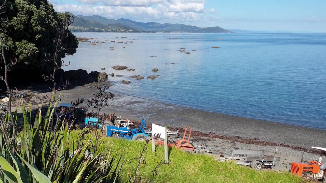 Awesome views of Te Kaha Beach resort with Te Kaha Beach, New Zealand ...