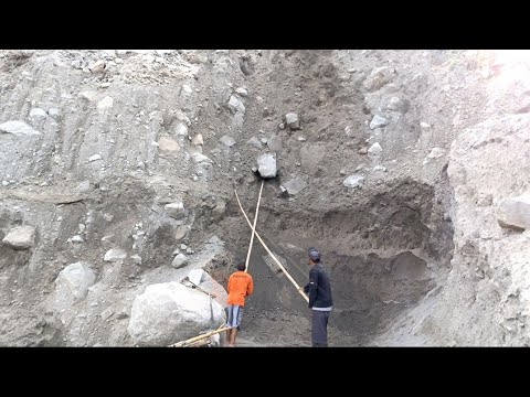 Dropping Rocks Attached To The Cliff Wall - YouTube