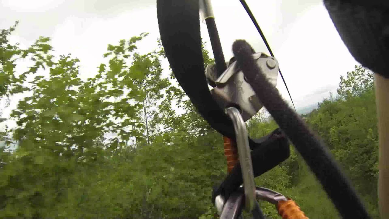 Ziplining down the "Thunderbird" zipline at Blue Mountain in ...