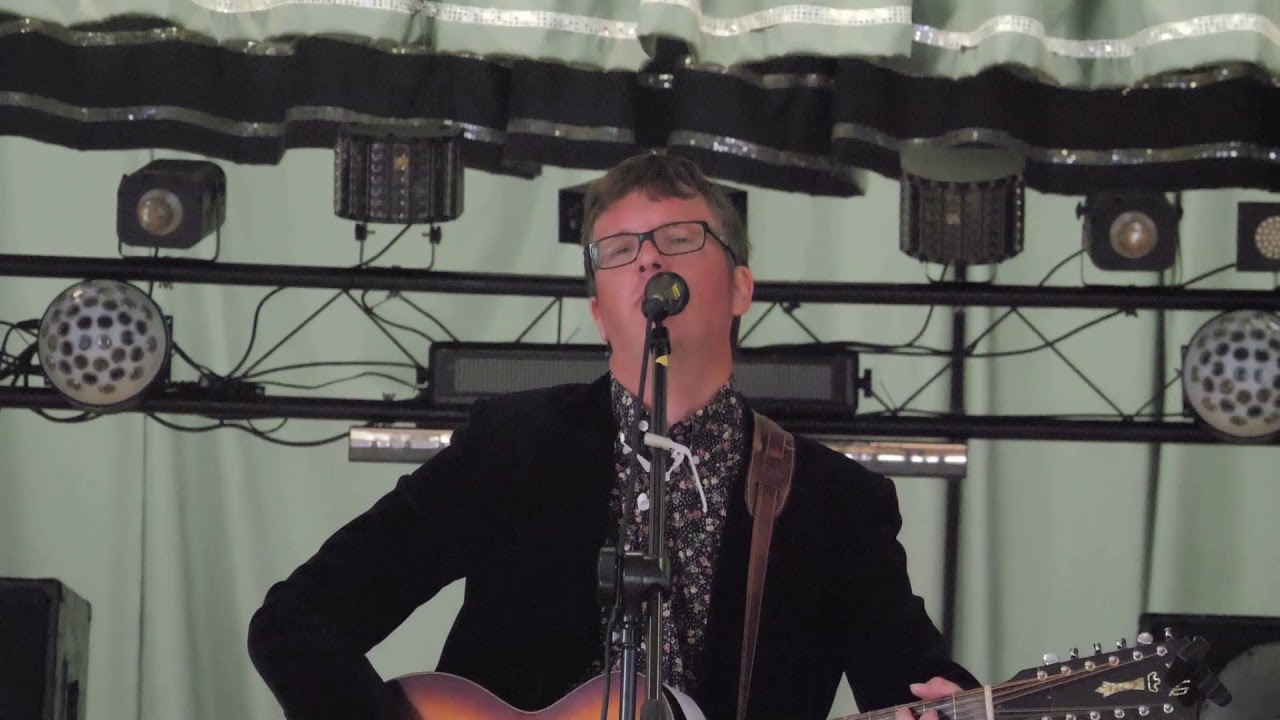 Leaving on a Jetplane. Played by Richard Craine. (Written by John ...