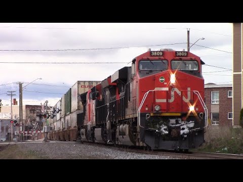 3809 Leads a Late CN Stack Train 120 through Downtown Moncton, NB - YouTube