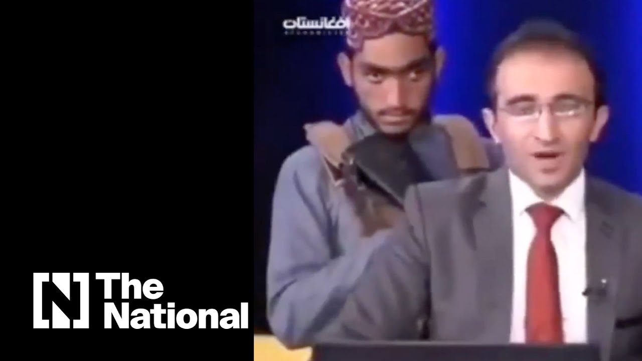 Afghan TV anchor interviews a Taliban member as armed fighters fill up ...