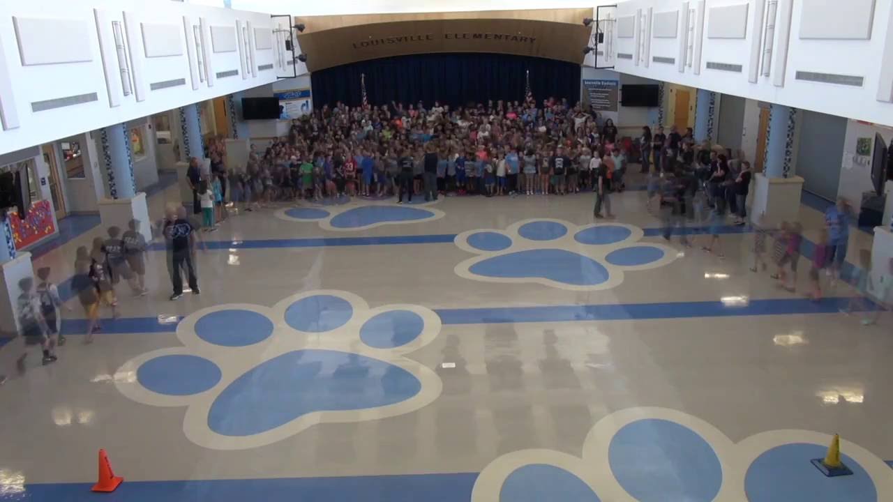 Louisville Elementary 1,100 students line up for the Pledge of ...