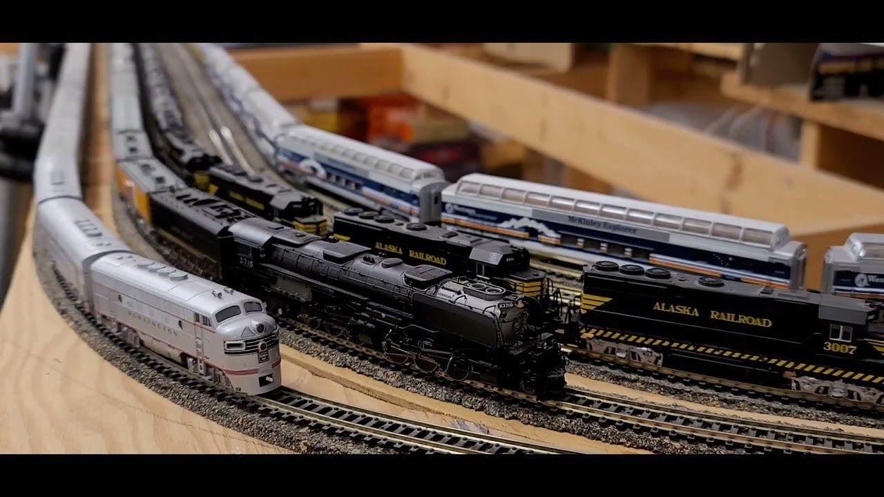 Long, slow N scale freight train. Very few will be able to watch from ...