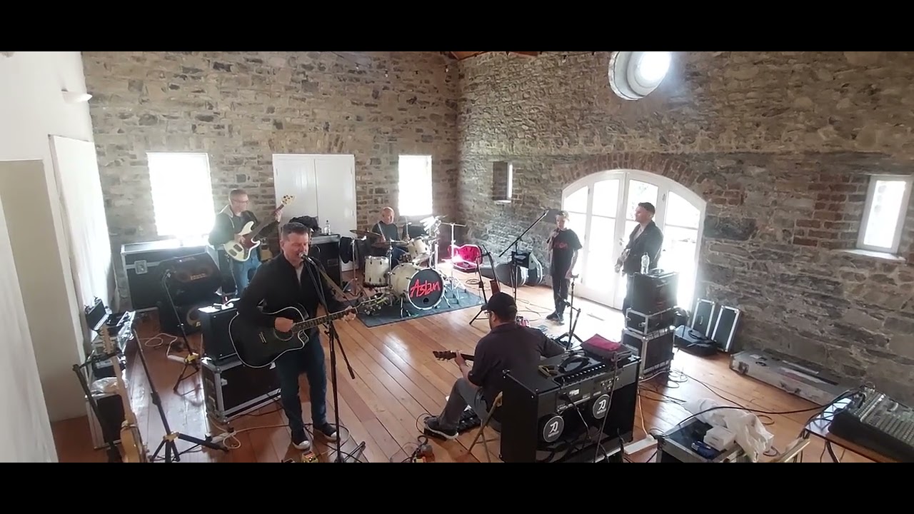 Aslan and Corey Hughes perform Crazy World - YouTube