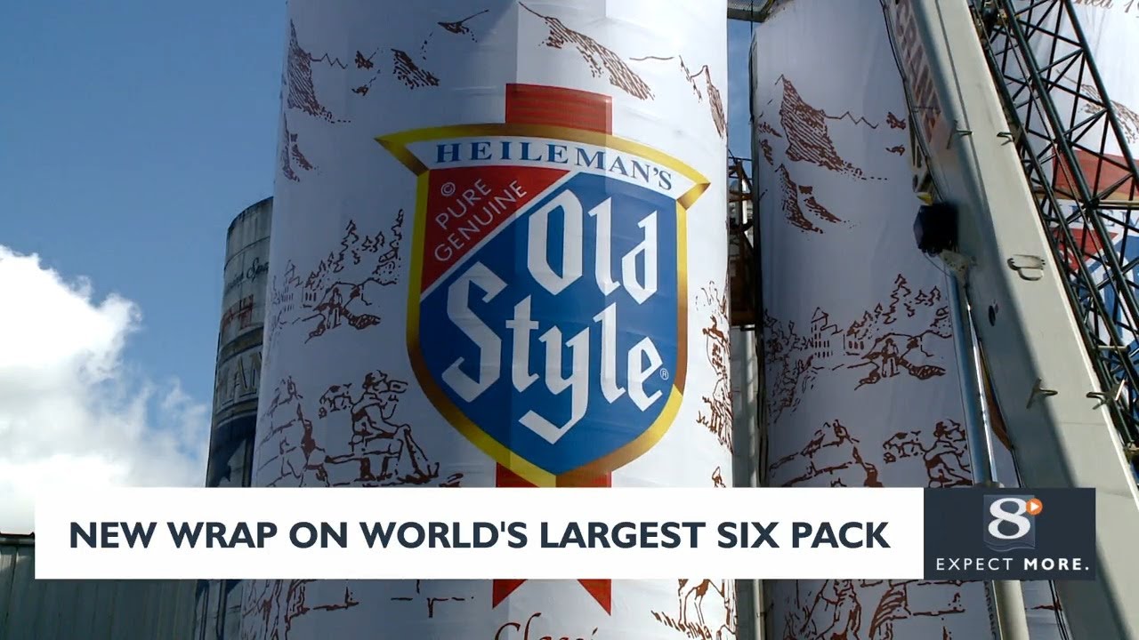 New wrap installed on the world's largest six pack - YouTube