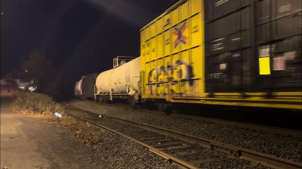 NS 4253 AC44C6M leads NS 10K through Piscataway,NJ with a BNSF ES44AC trailing & a ok crew - YouTube