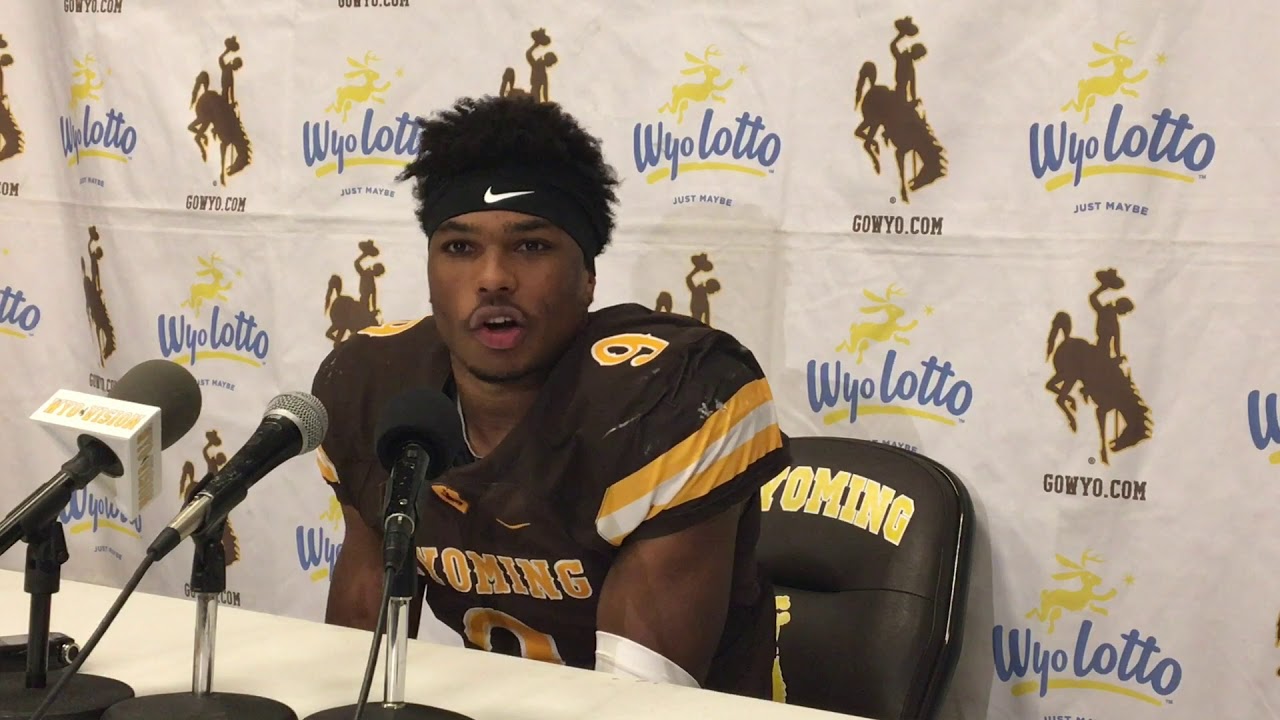 Wyoming's Tyler Hall scores on a kickoff for the second straight week ...