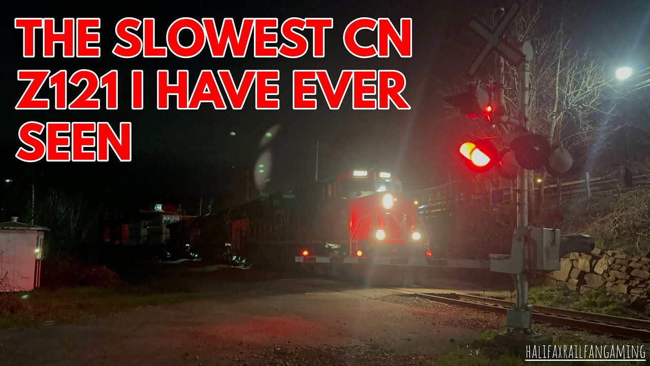 THE SLOWEST Z121 EVER! Late CN Z121 Through Shore Drive Level Crossing ...