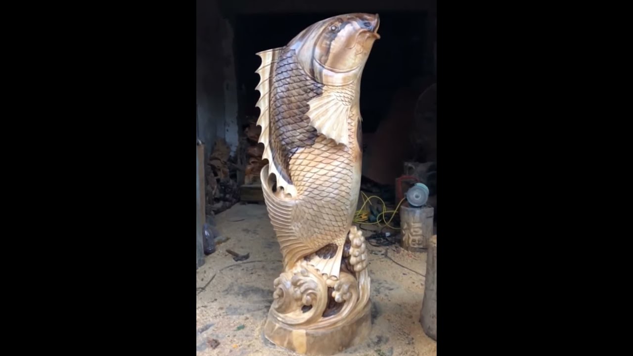 Creating_a_Sculpture_Fish_From_a_Tree_Trunk_Using_a_Chainsaw_Machines ...