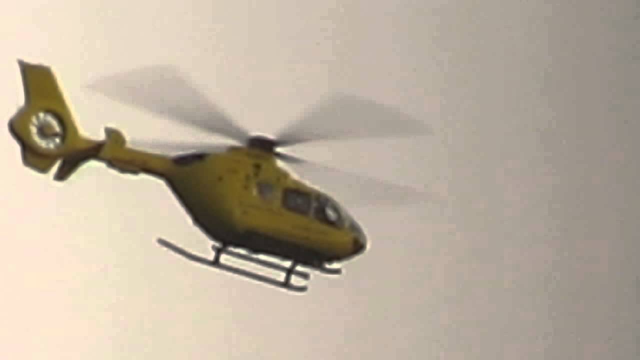 Yellow Heddlu Helicopter. - YouTube