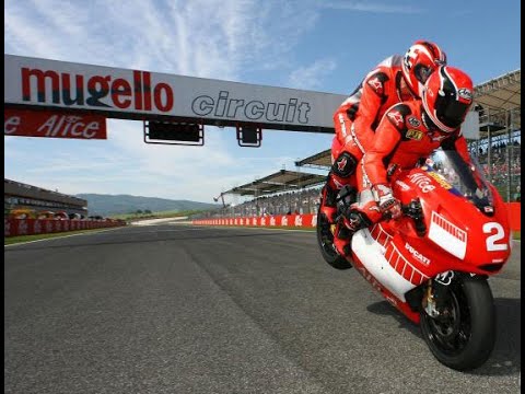 Michael Schumacher & Randy Mamola riding Ducati at Mugello