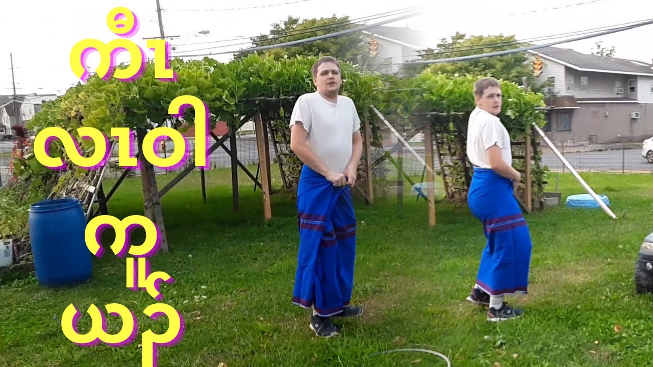 A white man demonstrates how to wear Karen Longyi - YouTube