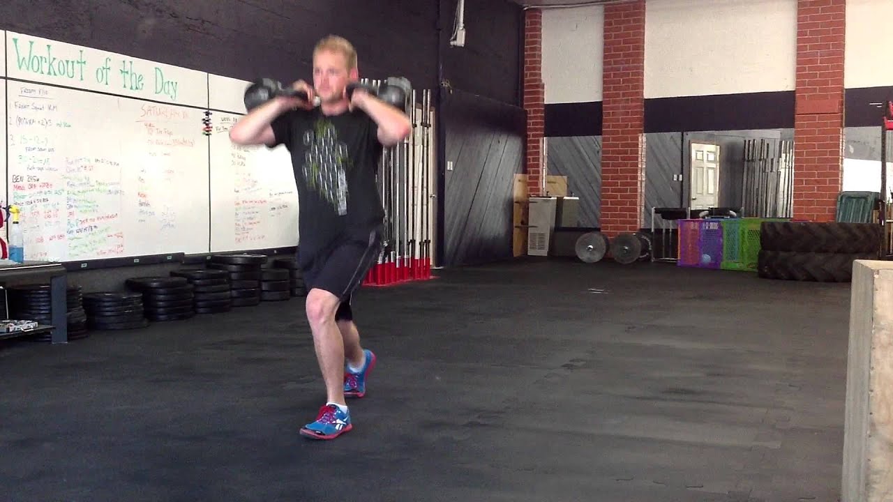 Double-Arm Kettlebell Rack Walking Lunge - YouTube