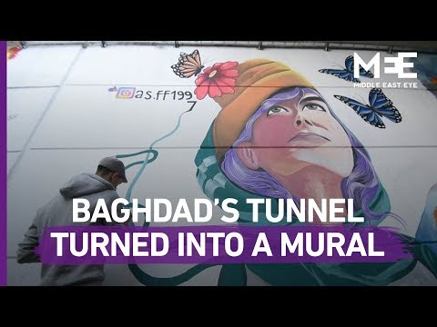Protesters turn Baghdad's iconic tunnel into a mural