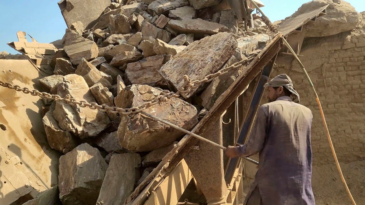 Skilled Man Dealing With Huge Rocks. Satisfying Stone Crushing Process ...