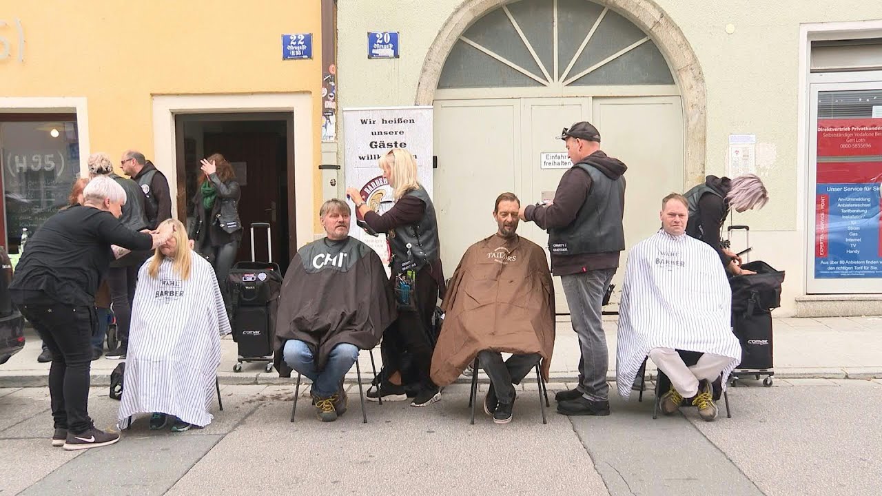 A "gang" of hairdressers offers haircuts to those in needs | AFP News ...