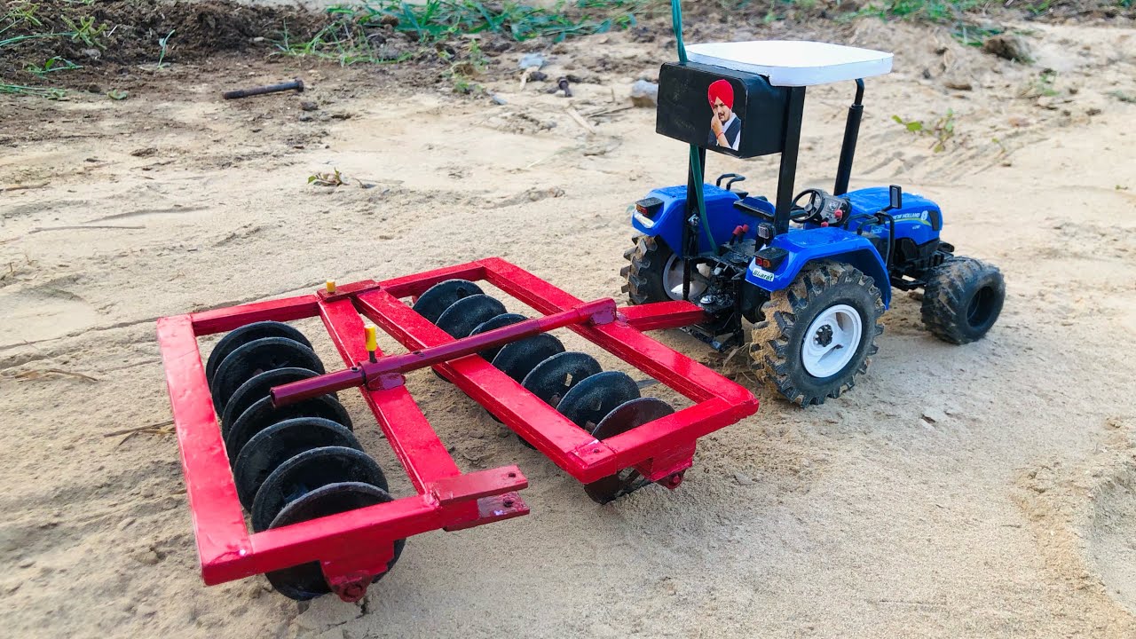 new holland 6010 with taviyan ! homemade harrow - YouTube