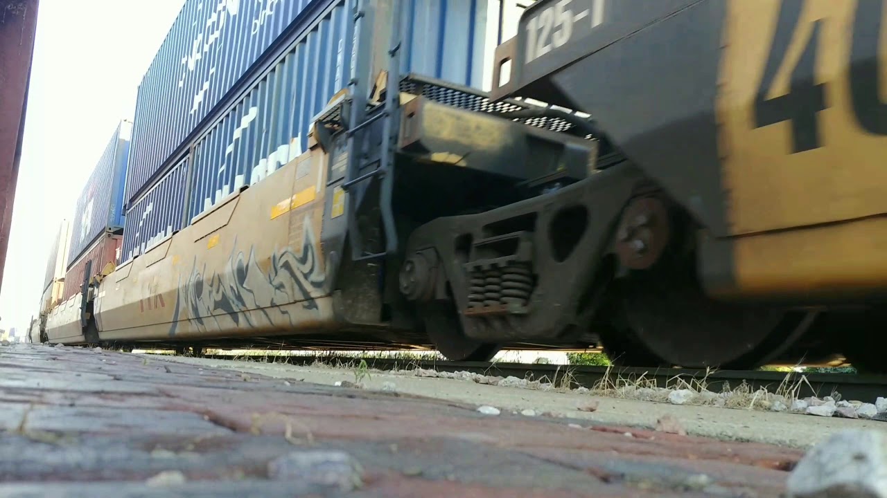 Iowa Interstate railroad switching intermodal cars at CRI&P depot ...