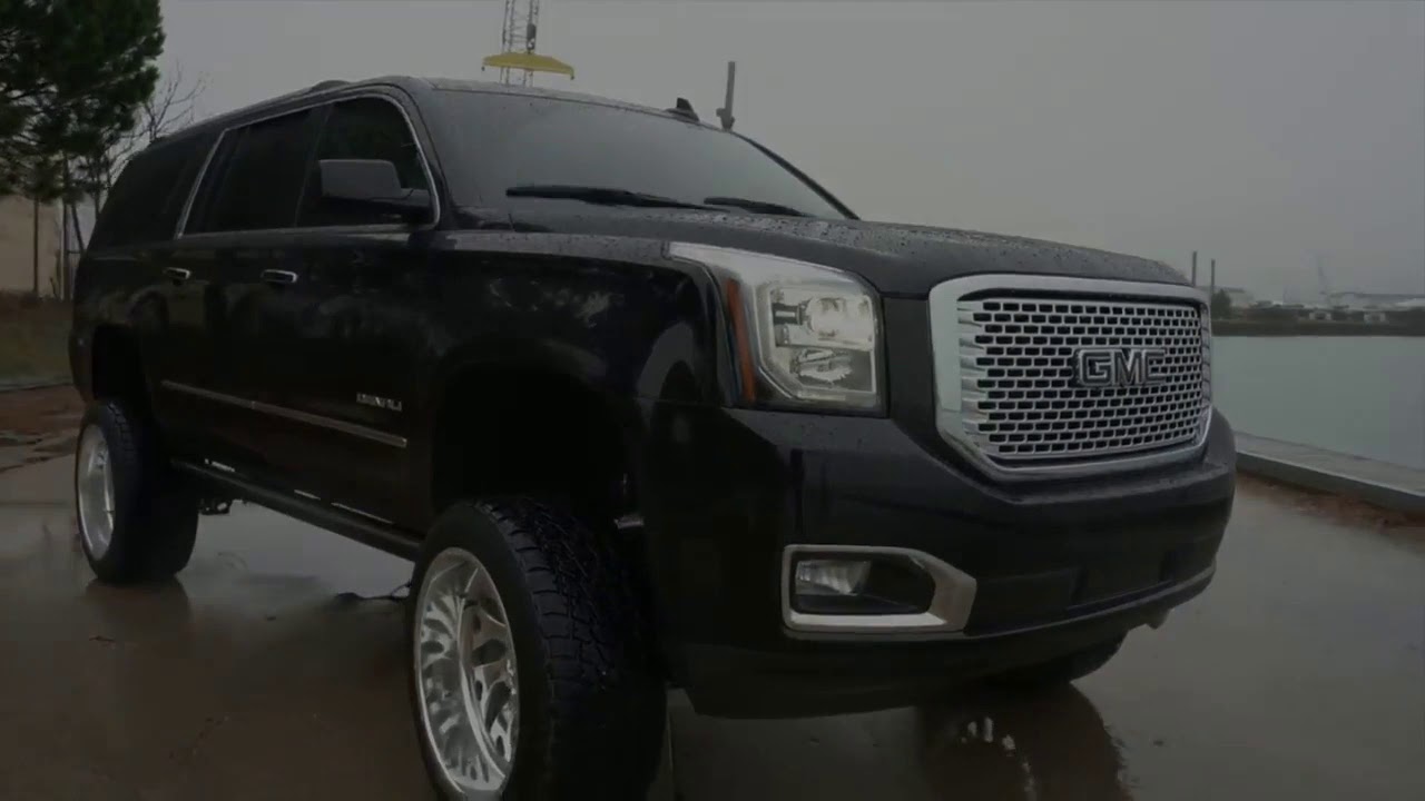 GMC Yukon Denali XL lifted on 33's - YouTube
