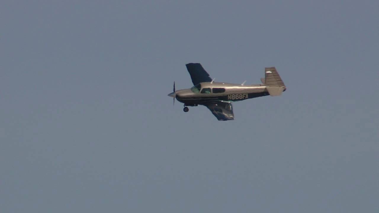 Mooney M20J makes a really short final approach into NASA - YouTube