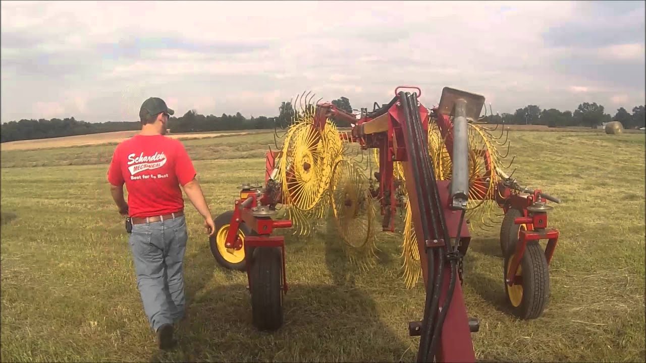 GoPro with 7210 and New Holland 14 wheel V-rake - YouTube