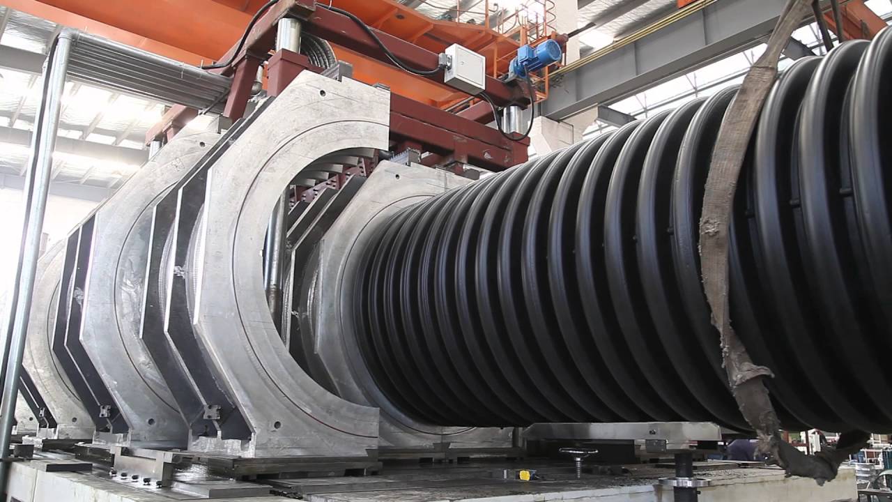 HDPE large diameter corrugator (corrugated pipe machine) - YouTube