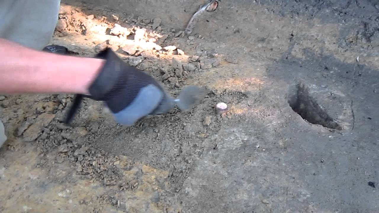 Excavating a clay cap from 1760 - YouTube