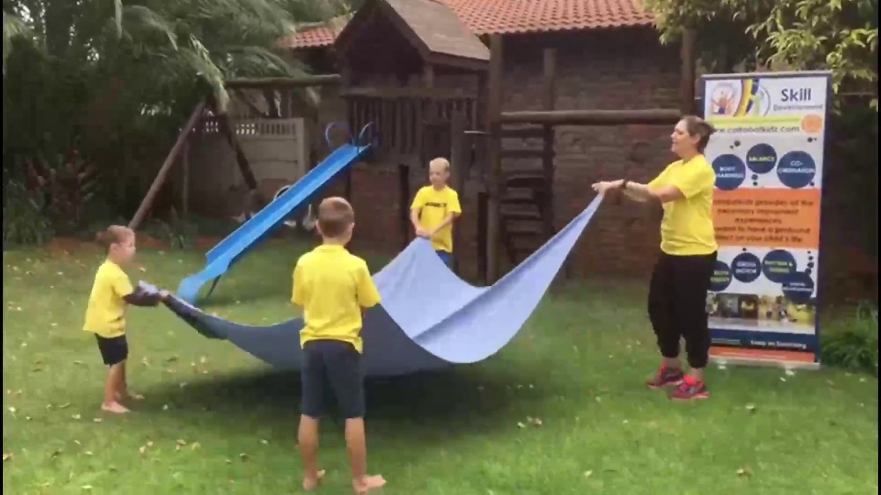 Catrobatkidz@Home with Anske demonstrating parachute activities for ...