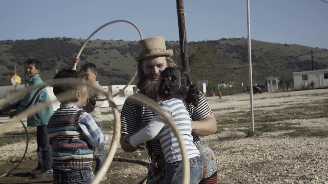Music, games and sumo with kids in Greek refugee camp - YouTube