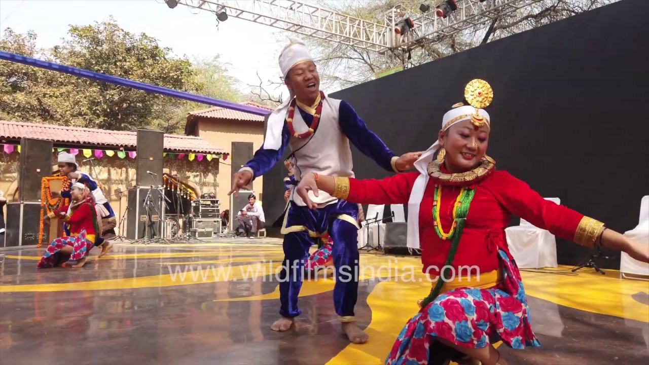 Nepali dance performance, with men and women in colourful attire - YouTube