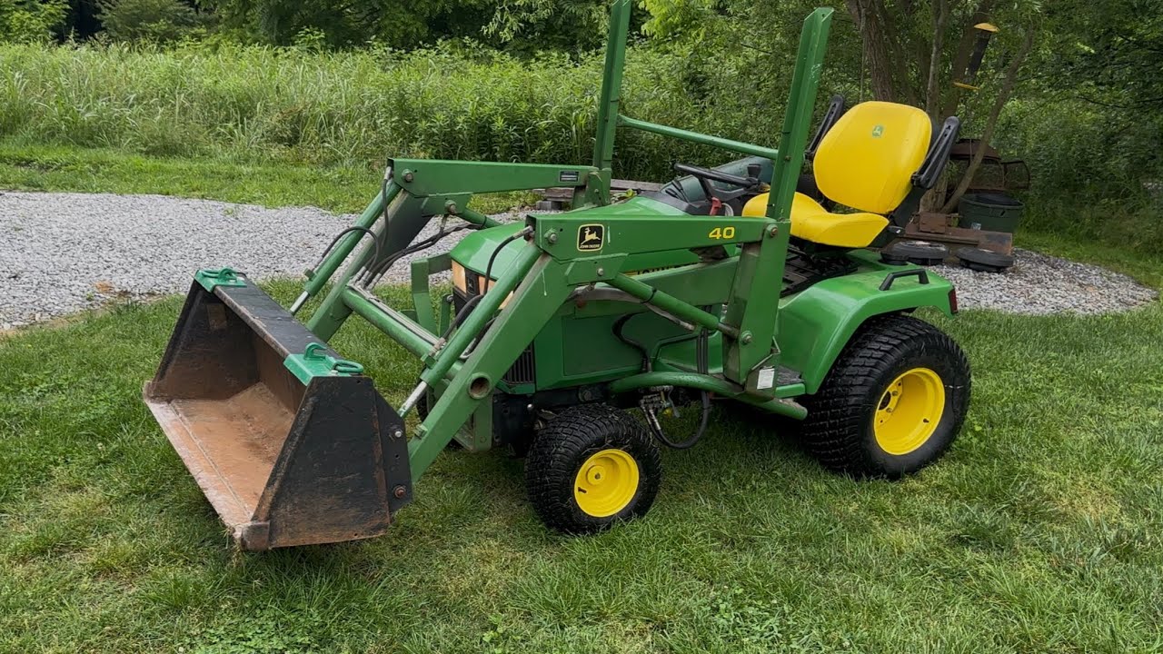 John Deere 445 with 40 loader - YouTube