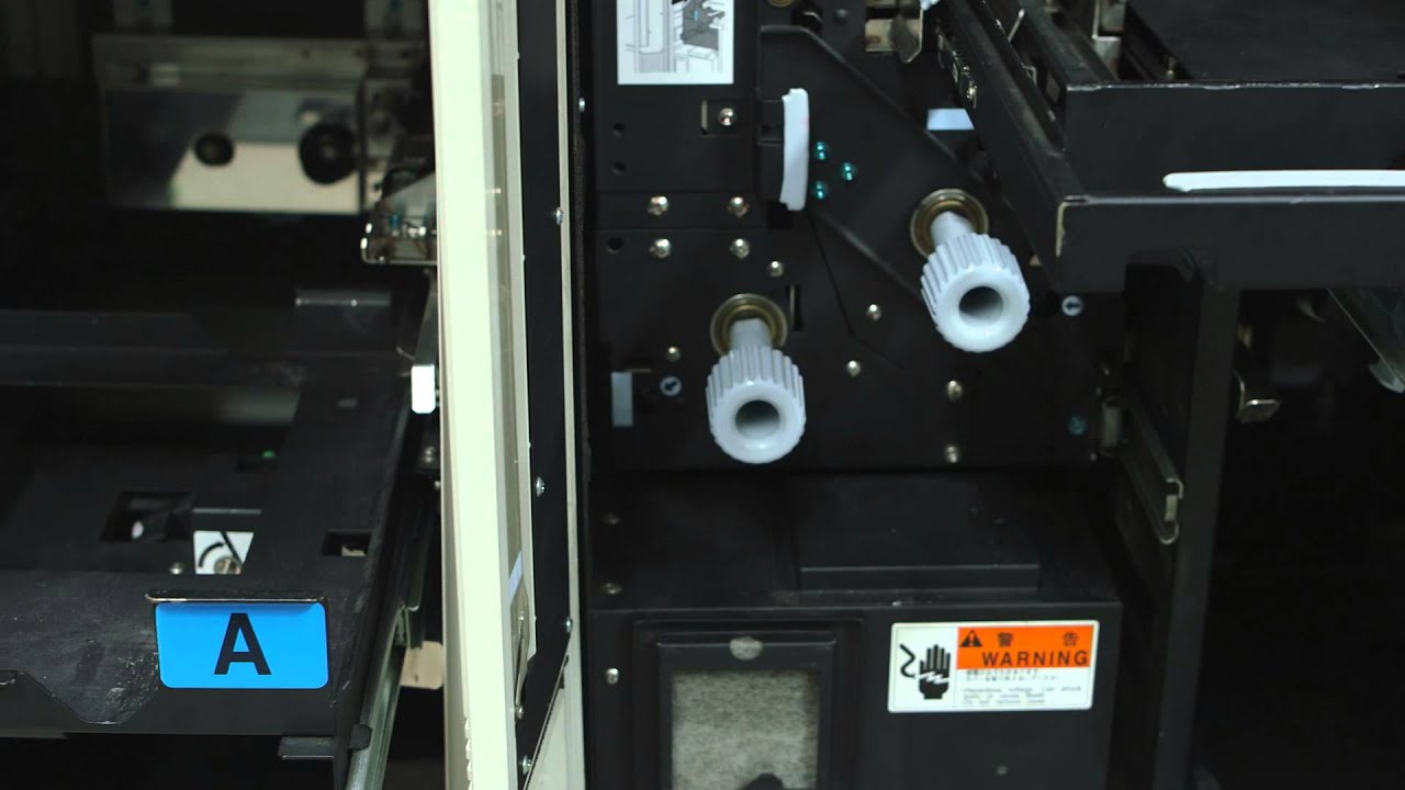 Noritsu 3202 triple loader - YouTube