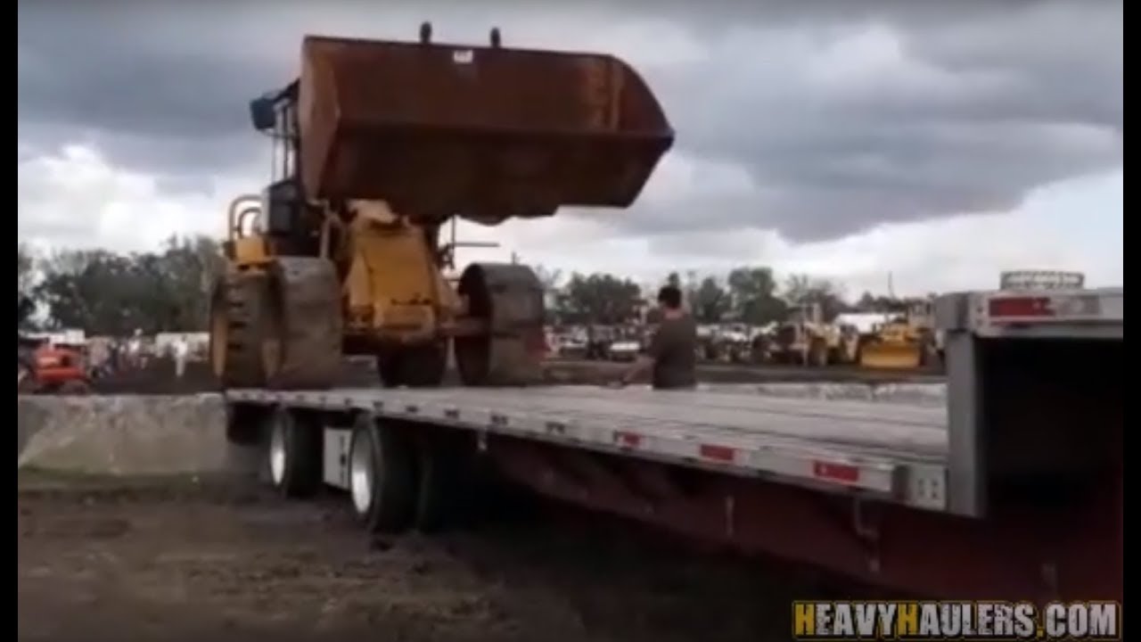 How to Load a Wheel Loader | With Heavy Haulers - YouTube