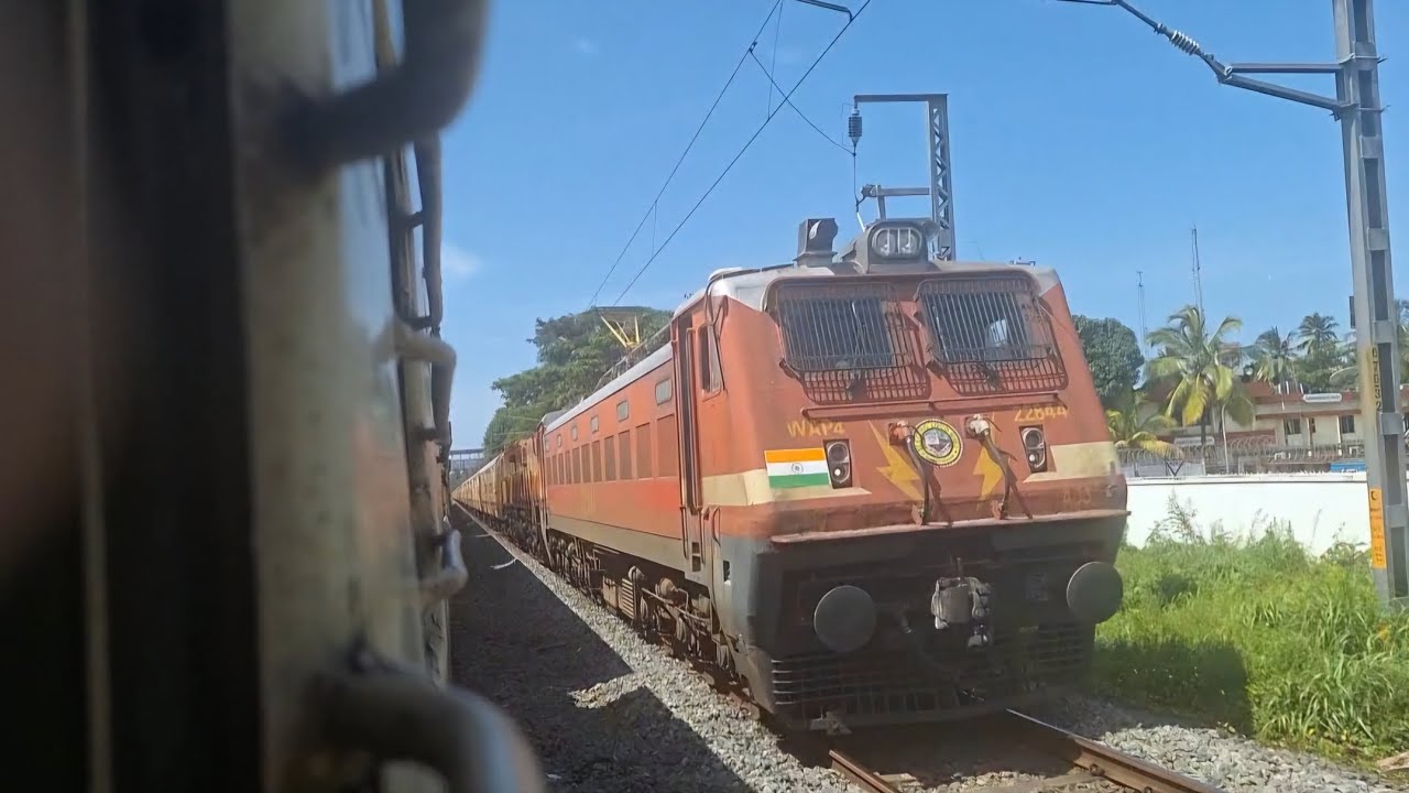 High Speed skip + crossing of two trains! 16160 meets 16305 at Elattur ...