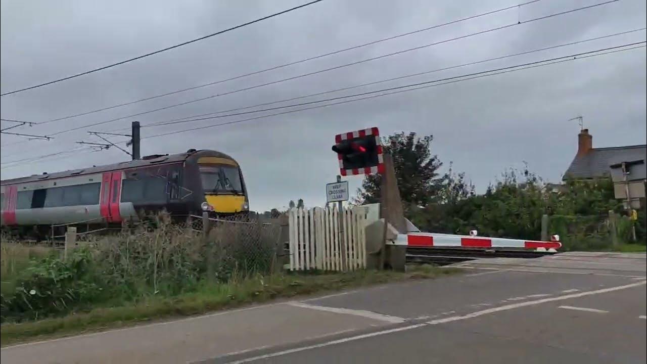 Trains at Speed UK - Level Crossing near Ely, Cambridgeshire - YouTube