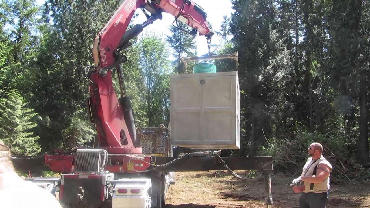 Lifting Septic Tanks into Hole via Remote Control - YouTube