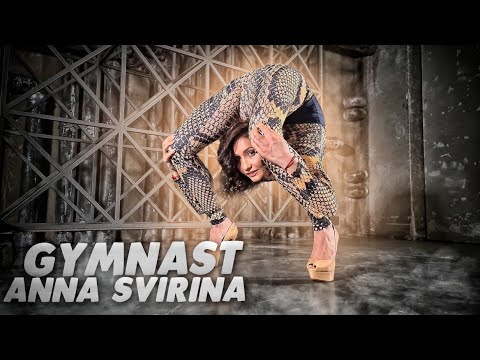 Flexshow. Gymnast Anna Svirina doing extreme backbends. Contortion routines in photostudio.