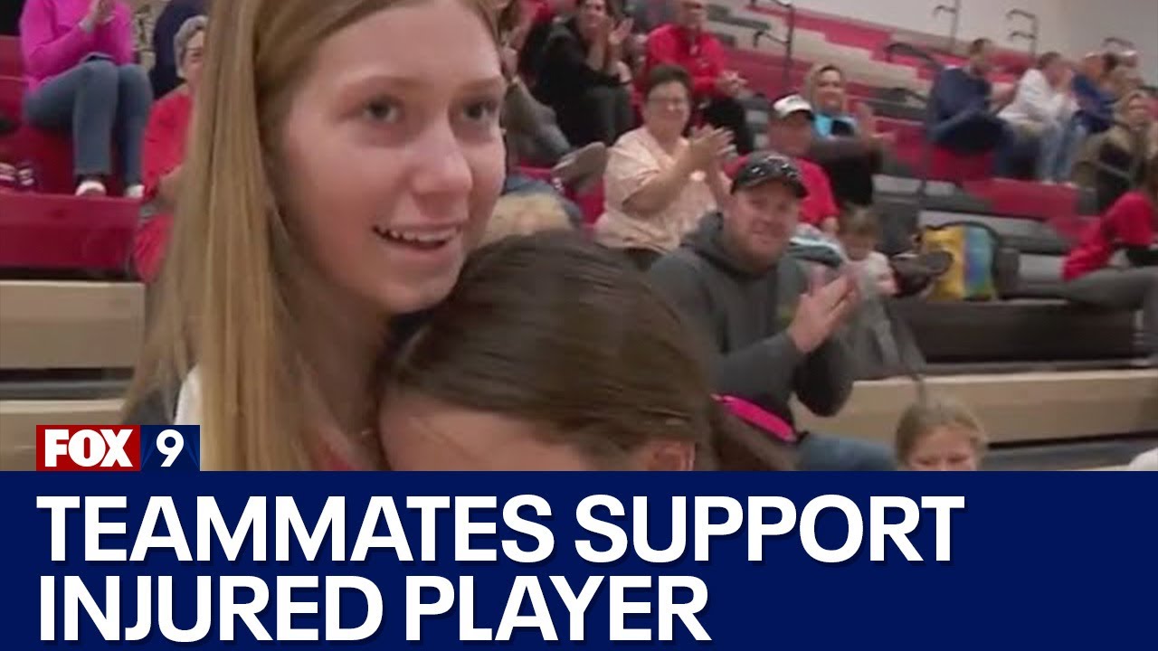 Teammates support injured volleyball player - YouTube