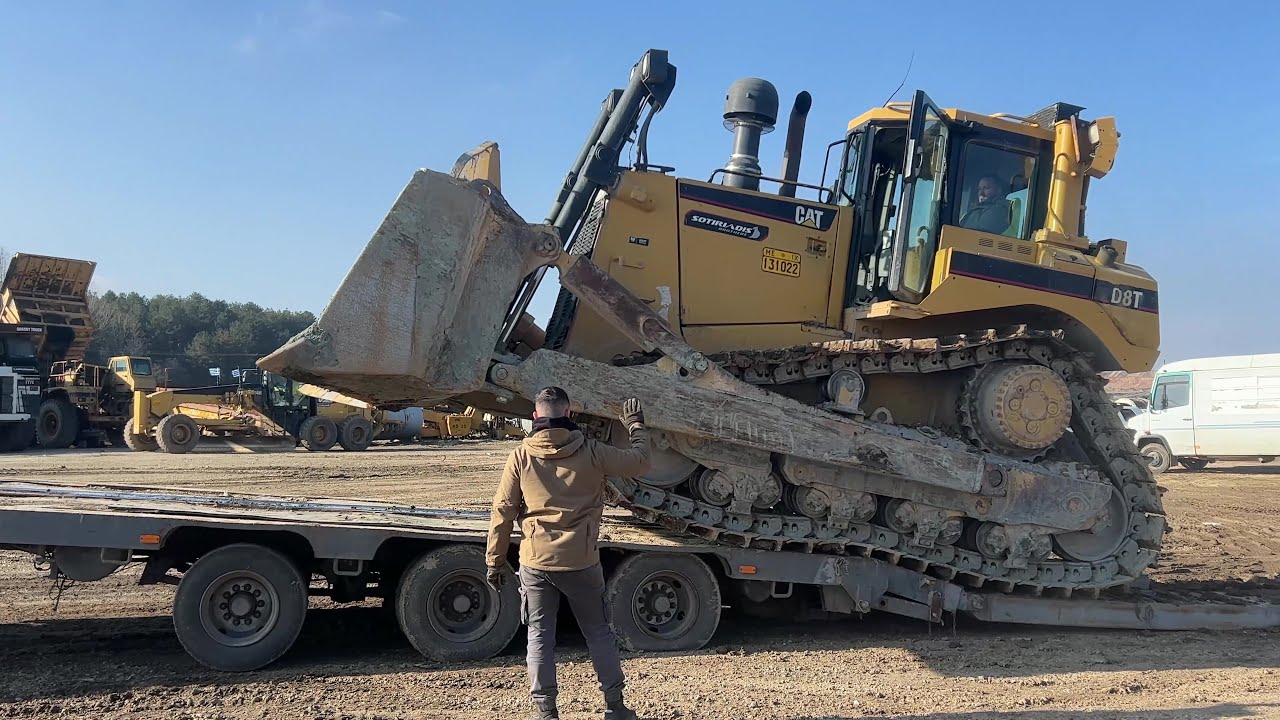 CEO Of Mega Machines Channel Loading & Transporting On Site The Cat D8T ...
