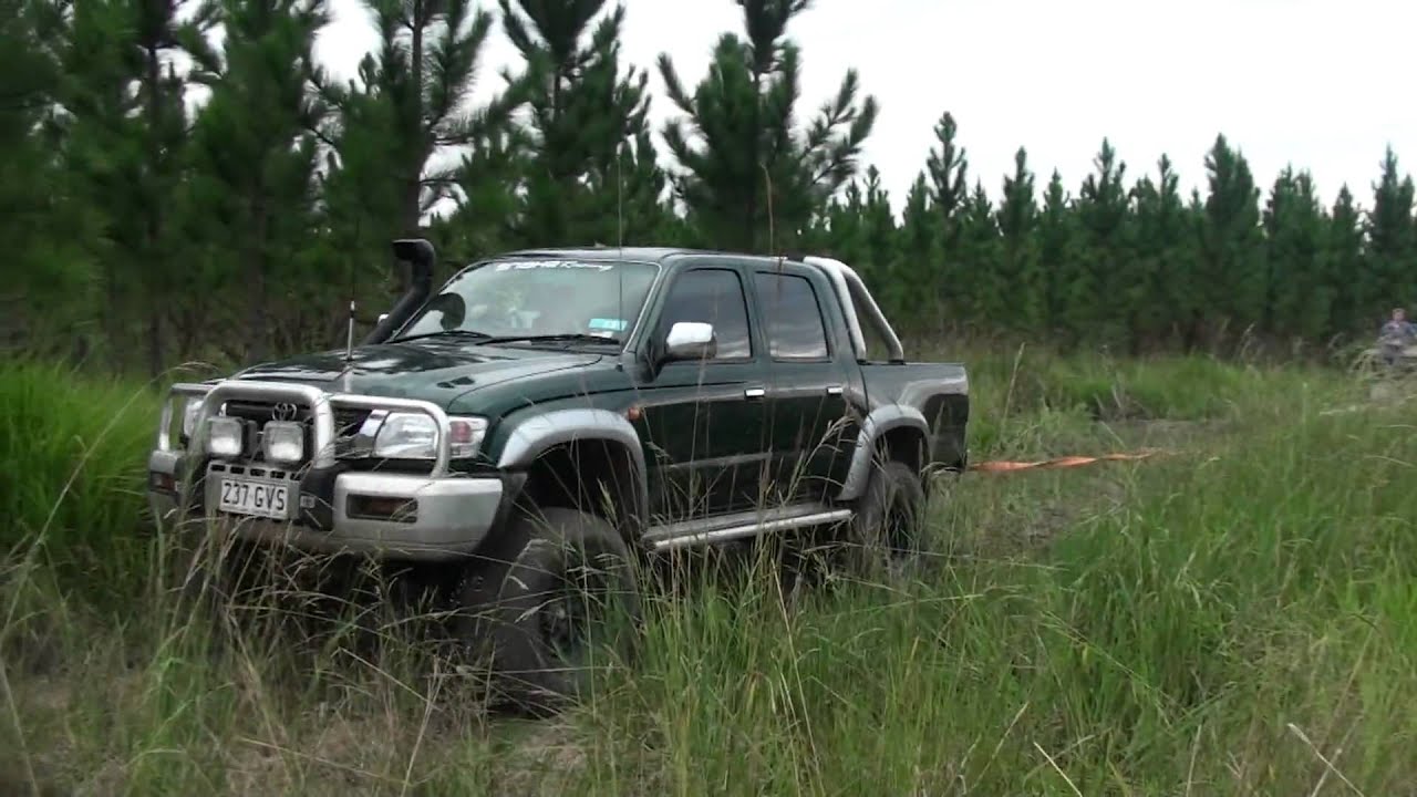 4X4 Nissan Patrol 4.2 Recovery by Hilux mud bog hole M1 Bruce Highway ...
