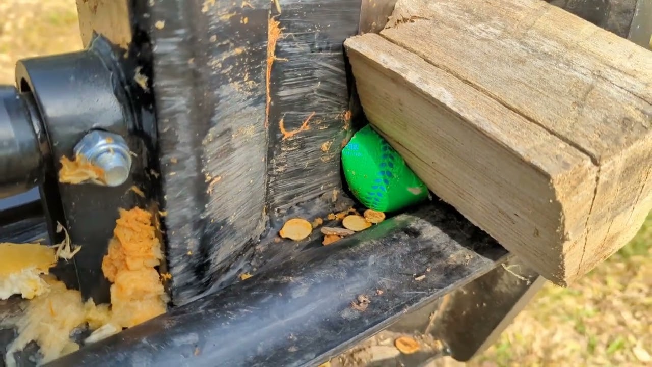 Green Squishy Ball In Log Splitter @The Log Splitter Channel - YouTube
