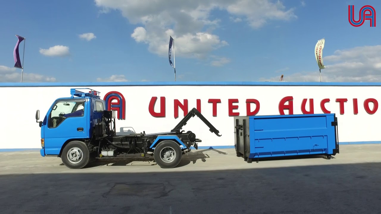 ISUZU ELF ARM ROLL DUMP - UNITED AUCTIONEERS INC - YouTube