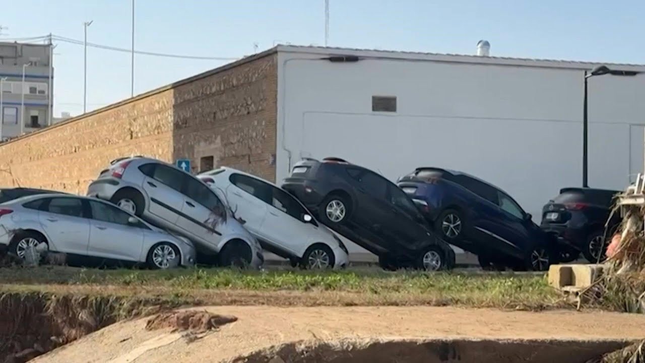 Cars piled up in Valencia after deadly Spain floods | AFP - YouTube